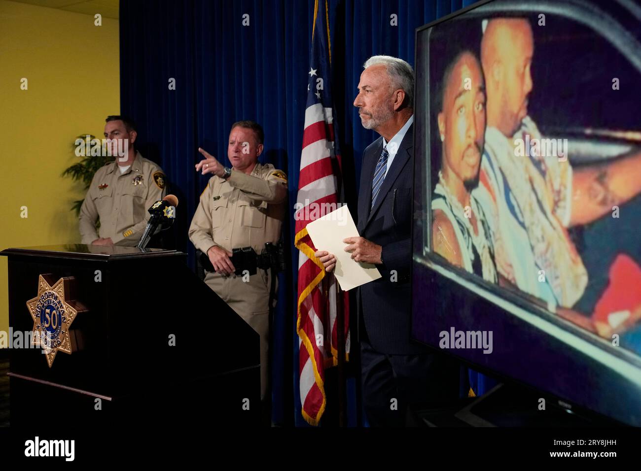 From left, Las Vegas police Lt. Jason Johansson, Sheriff Kevin McMahill ...