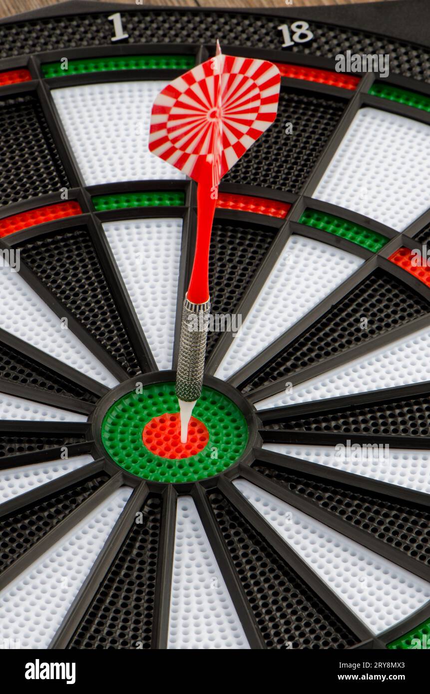Dart board with dart Stock Photo - Alamy