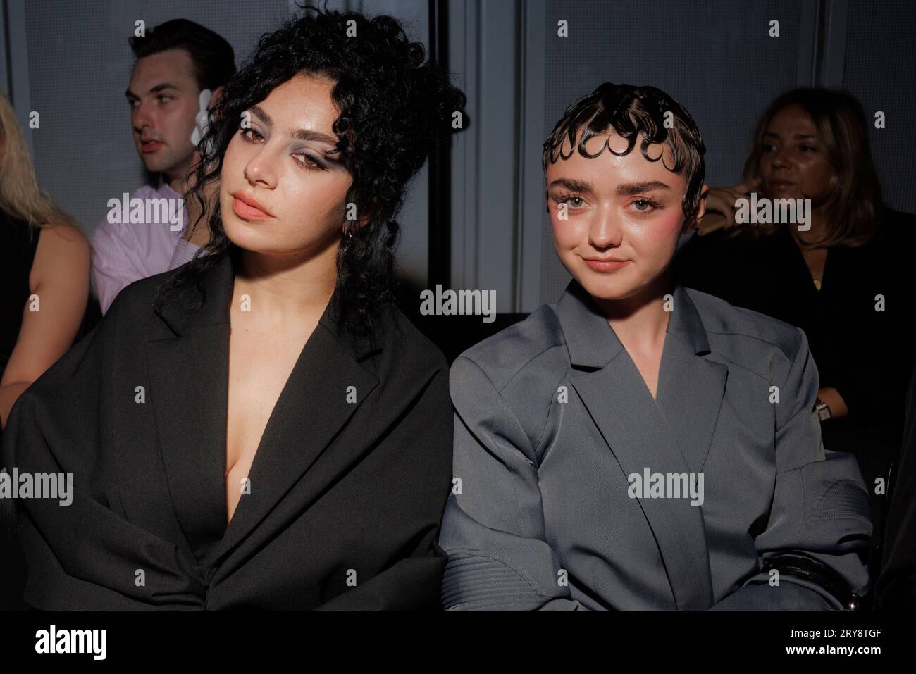 Charli XCX, left, and Maisie Williams attend the Coperni Spring/Summer ...