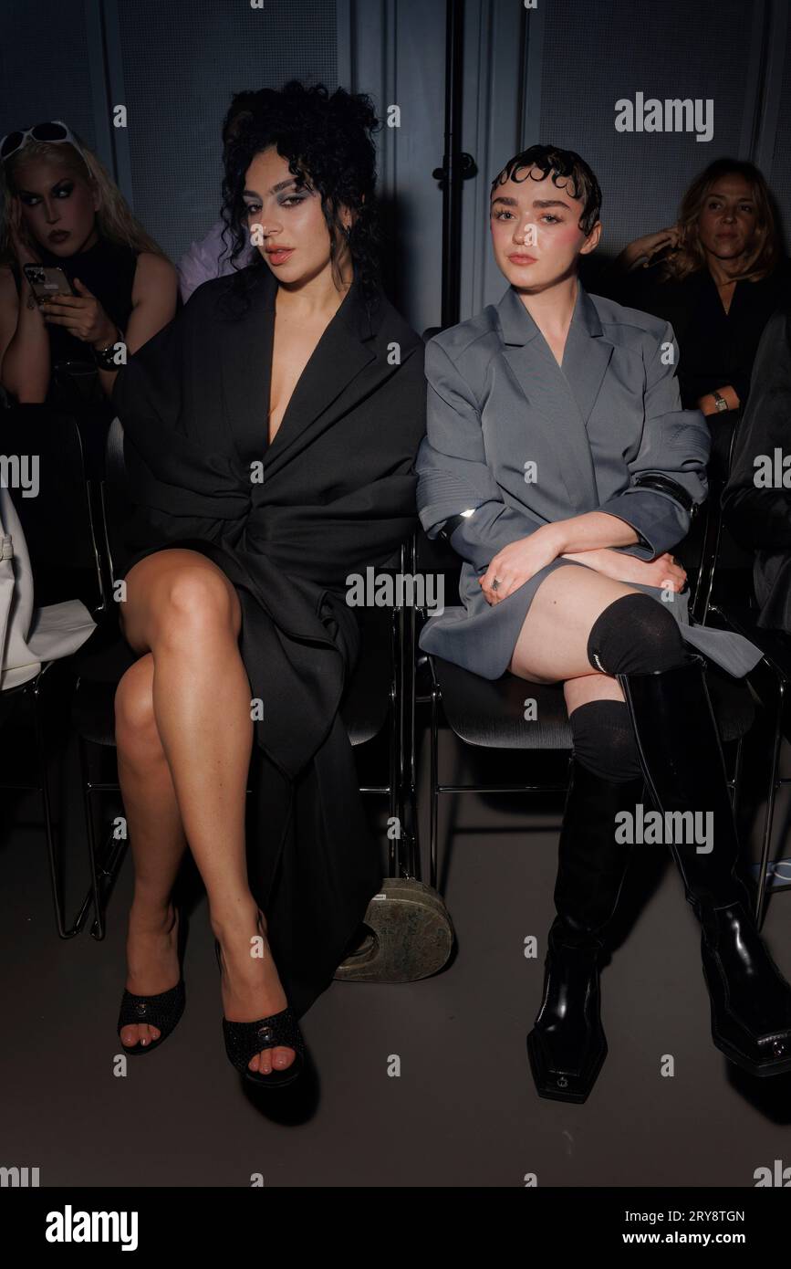 Charli XCX, left, and Maisie Williams attend the Coperni Spring/Summer ...