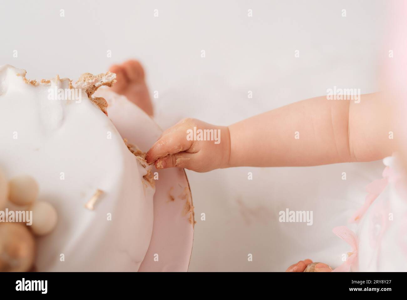 Hand reaching cake hi-res stock photography and images - Alamy