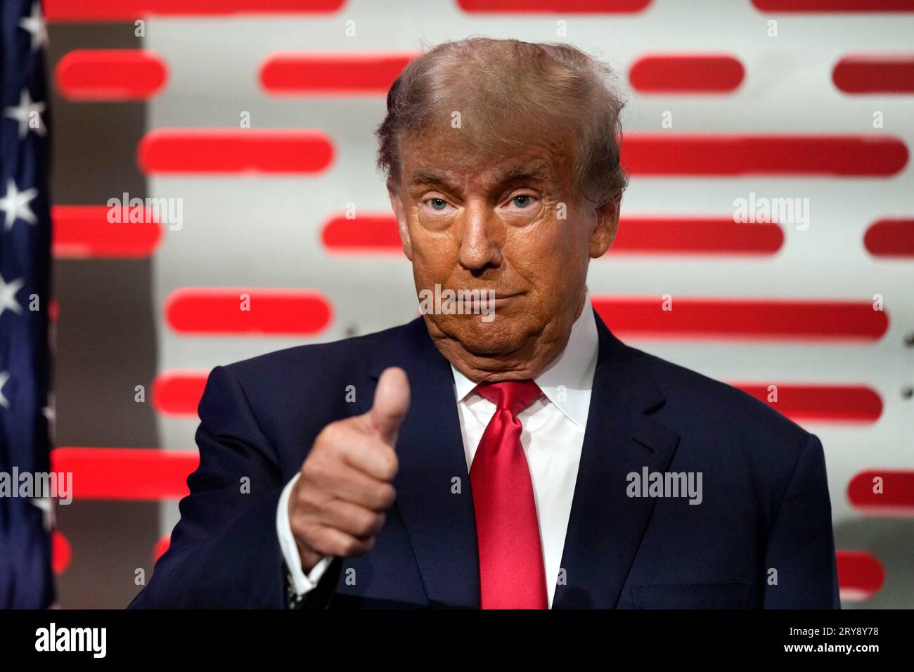 Former President Donald Trump gesture to the crowd before his speech at ...
