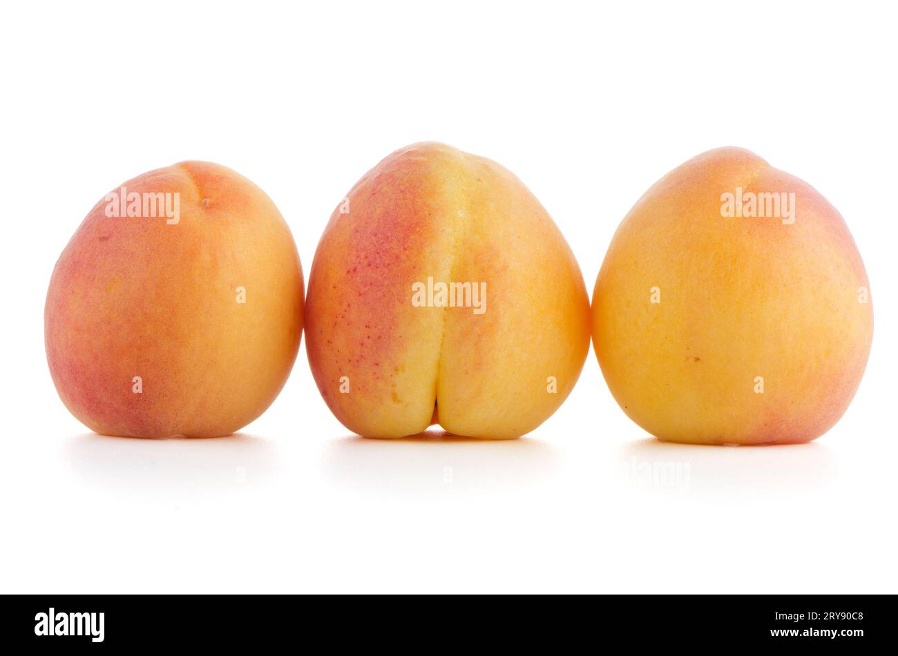 Three sweet peaches Stock Photo - Alamy