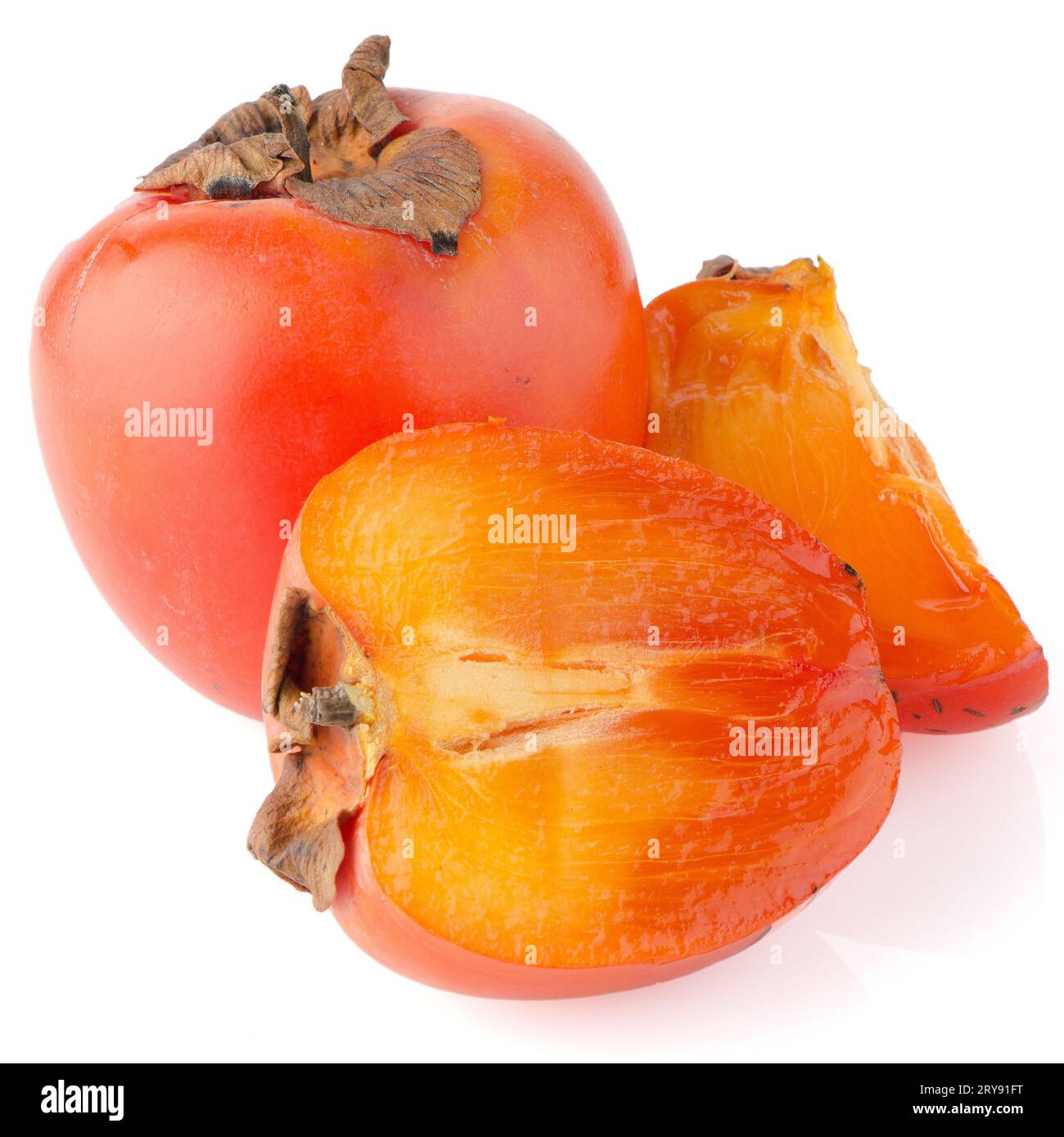 Persimmon with slice Stock Photo - Alamy