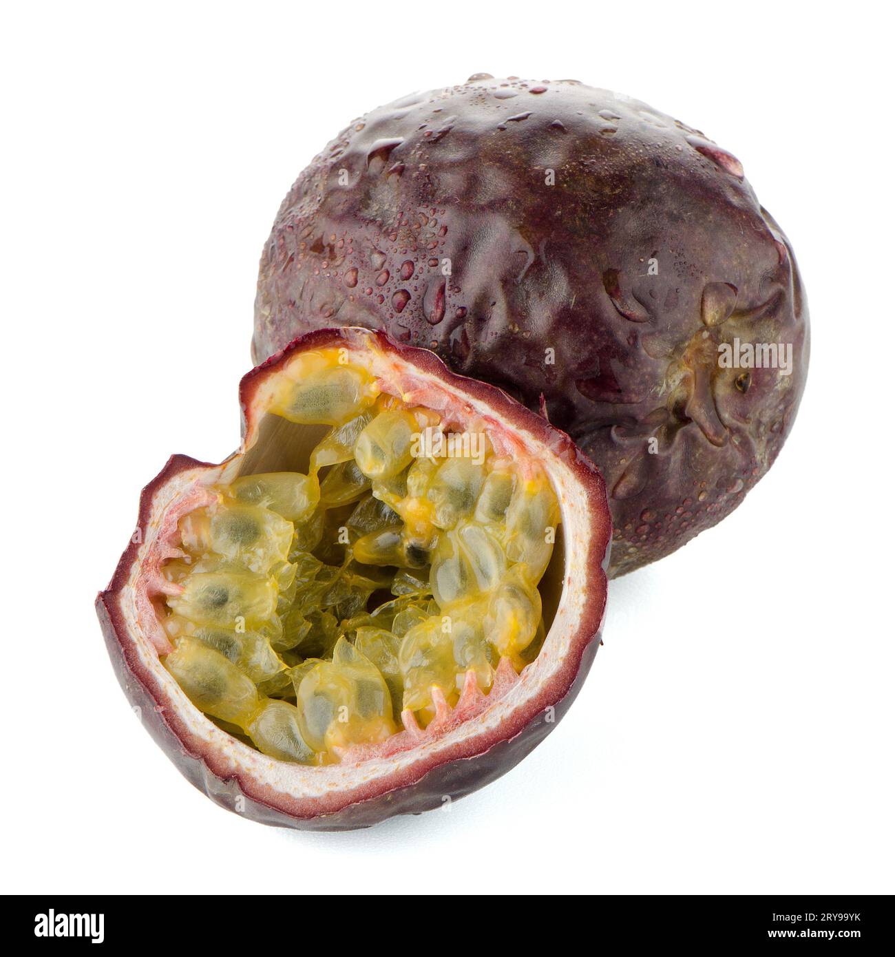 Half passion fruit seeds hi-res stock photography and images - Alamy