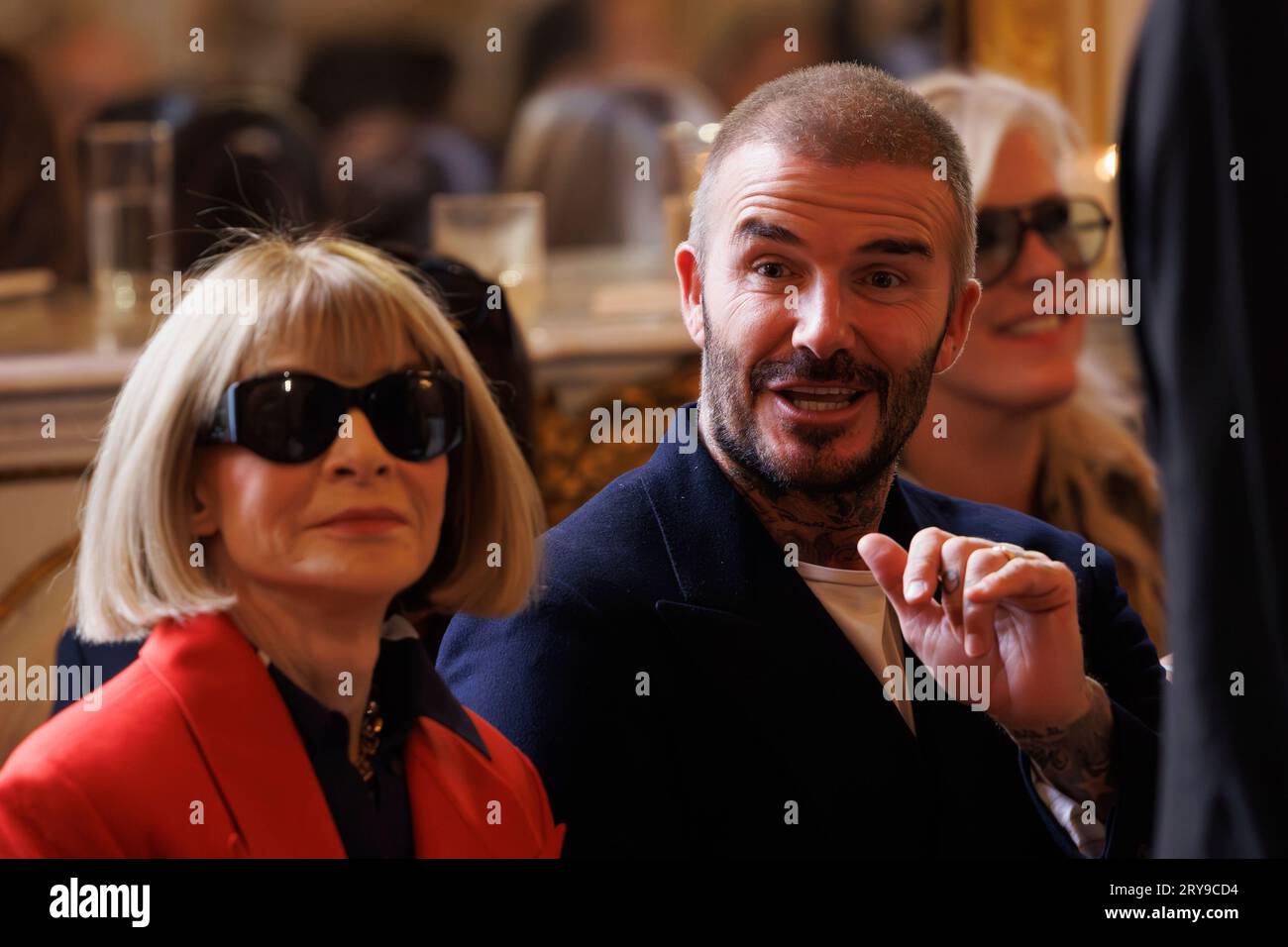 Anna Wintour, left and David Beckham attend the Victoria Beckham Spring ...