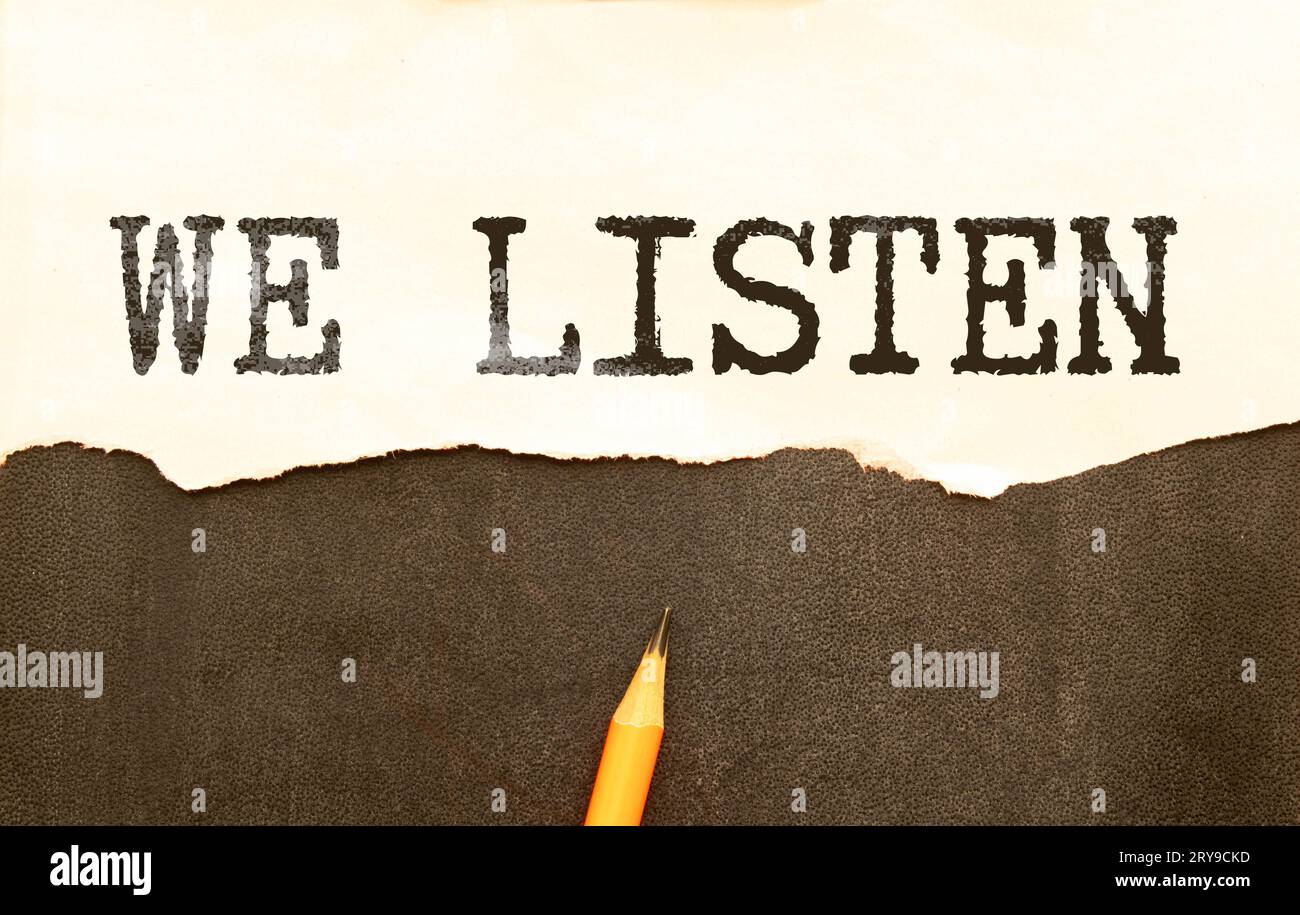 Time to listen symbol. Concept words Time to listen on white notebook ...