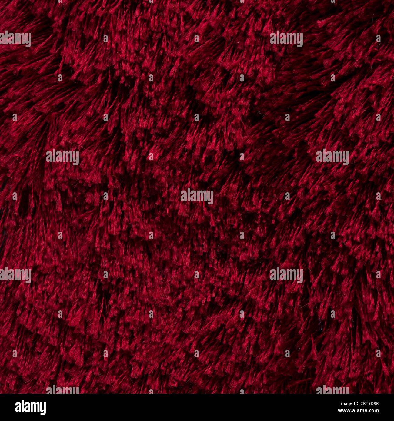 Closeup detail of red carpet texture background Stock Photo - Alamy