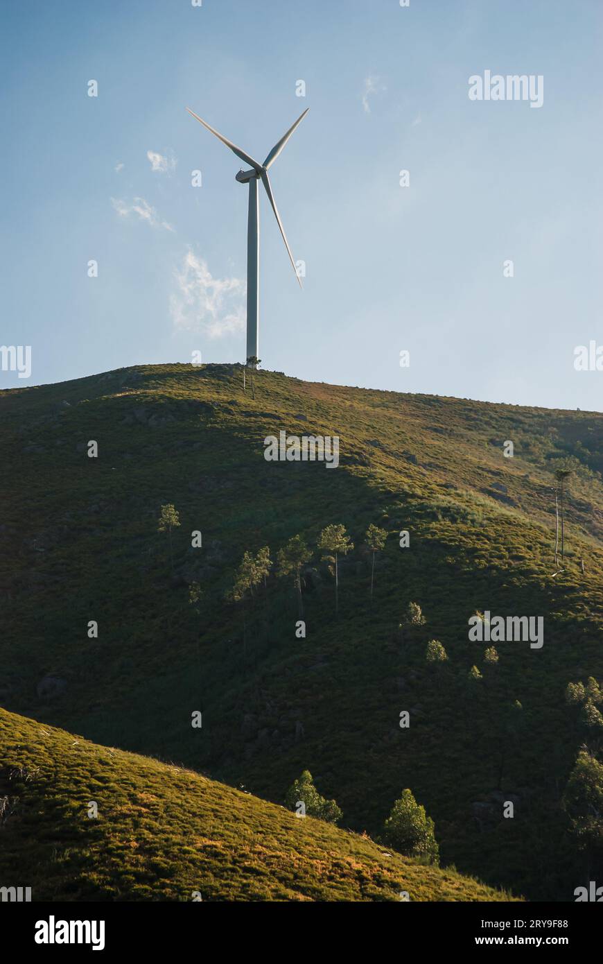 Wind turbine on a hill Stock Photo - Alamy