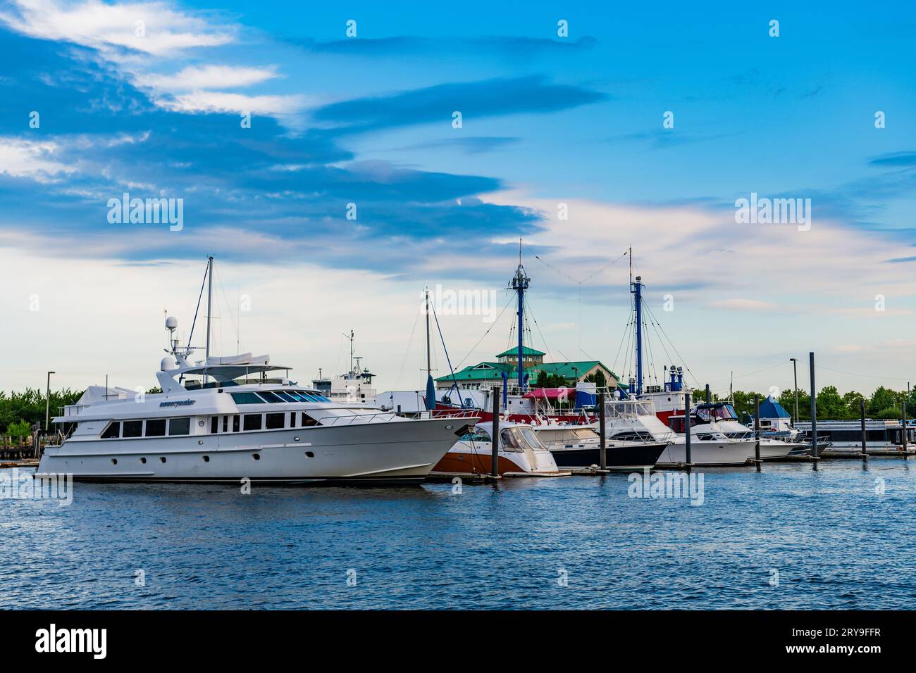 Jersey City, USA - June 28, 2023: Luxury yacht and ferry docked at ...