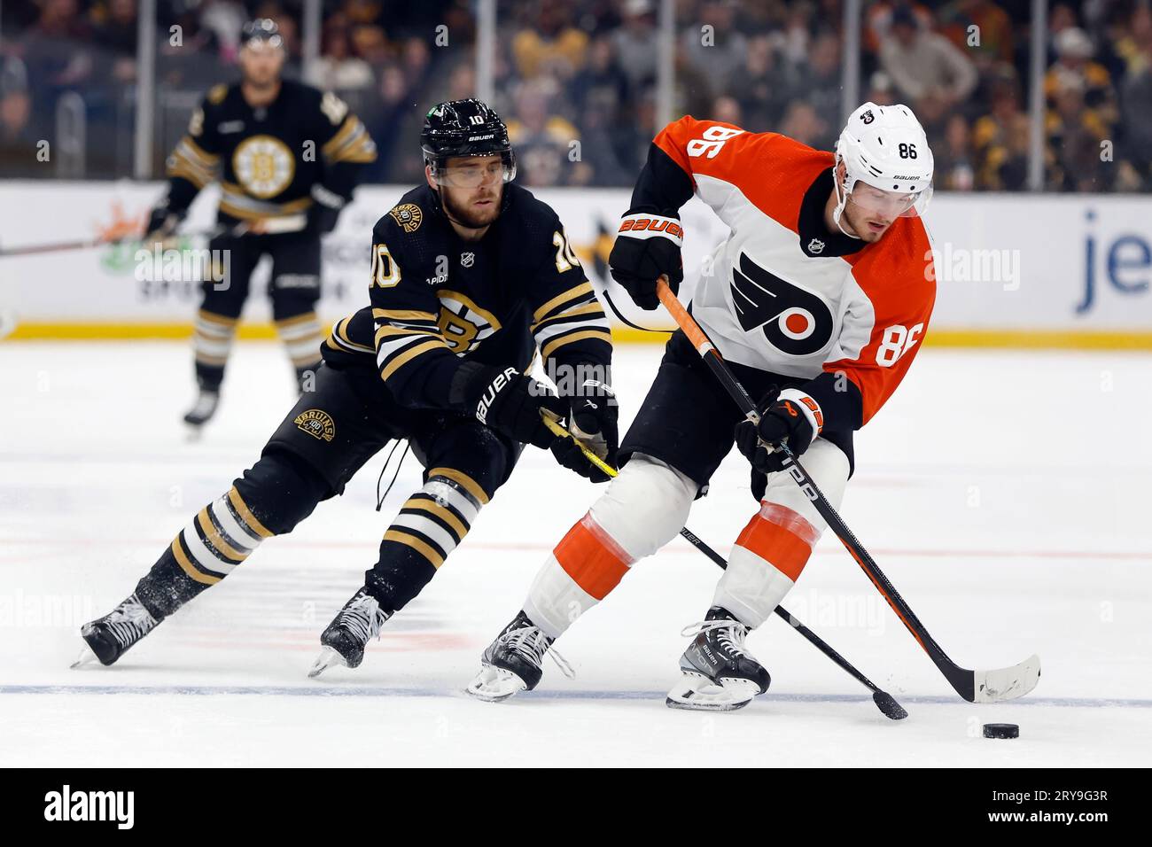 Boston Bruins' A.J. Greer (10) defends against Philadelphia Flyers ...