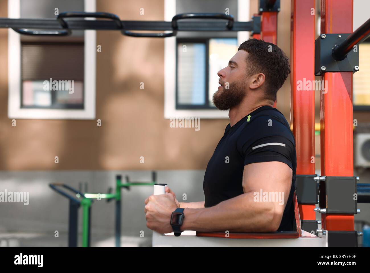 Young handsome bodybuilder doing knee hi-res stock photography and ...