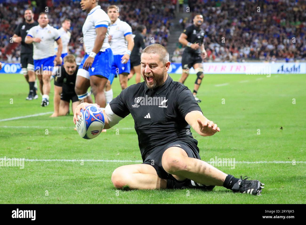 Dane Coles #16 of New Zealand scores during the Rugby World Cup Pool A ...