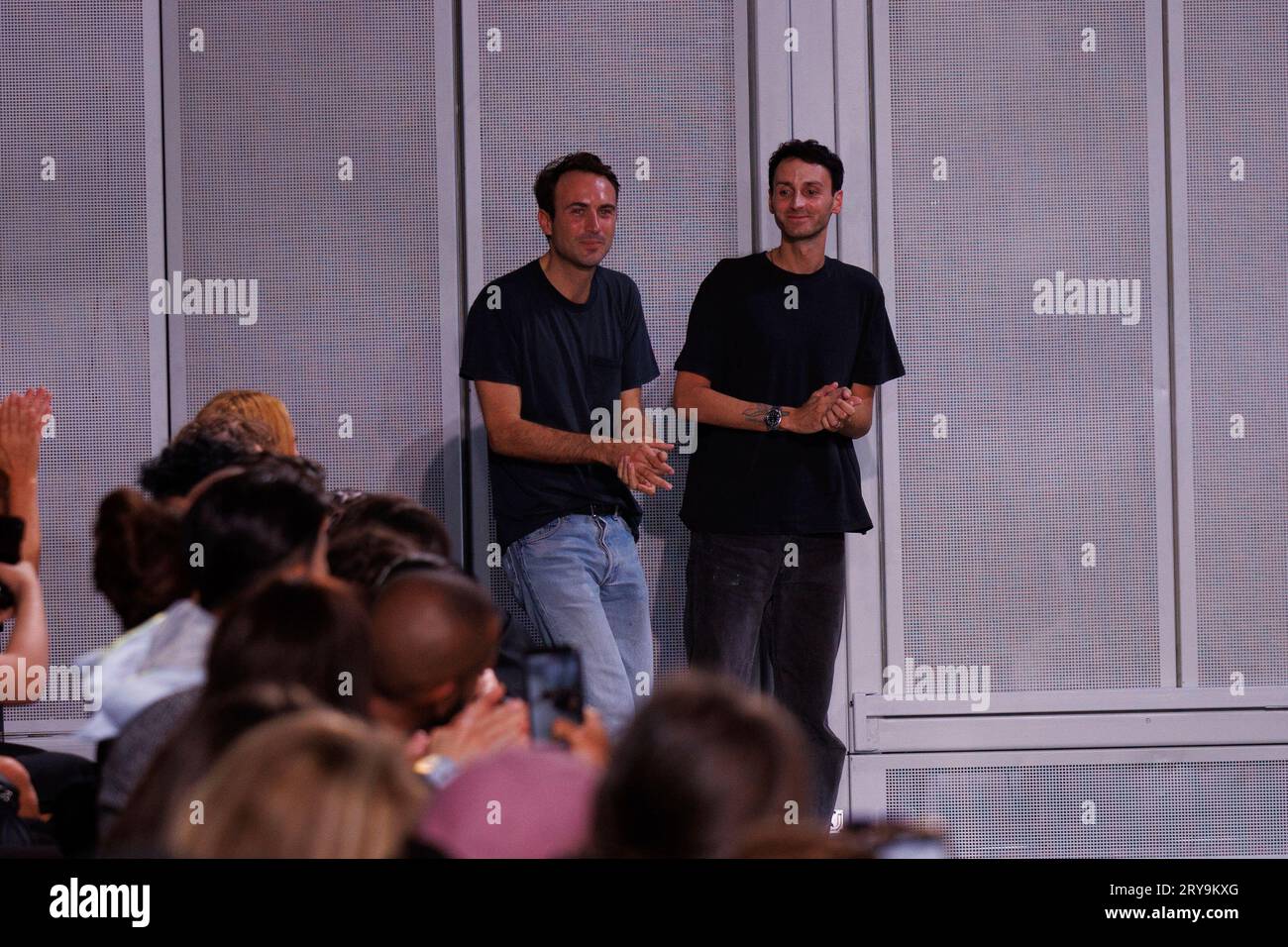 Designers Sebastien Meyer and Arnaud Vaillant acknowledge applause ...