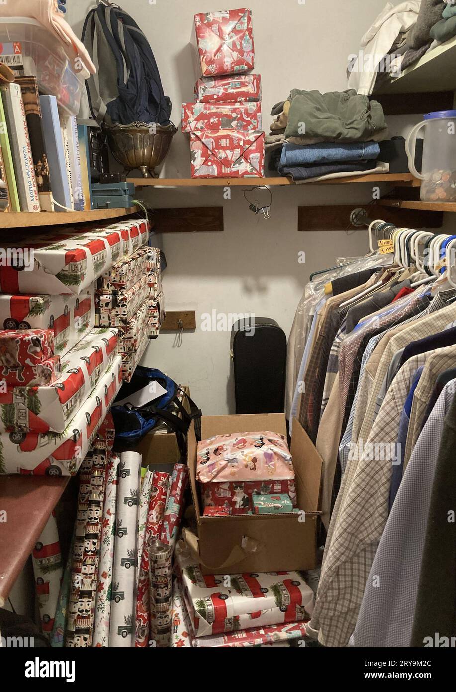 Hiding in closet hi-res stock photography and images - Alamy