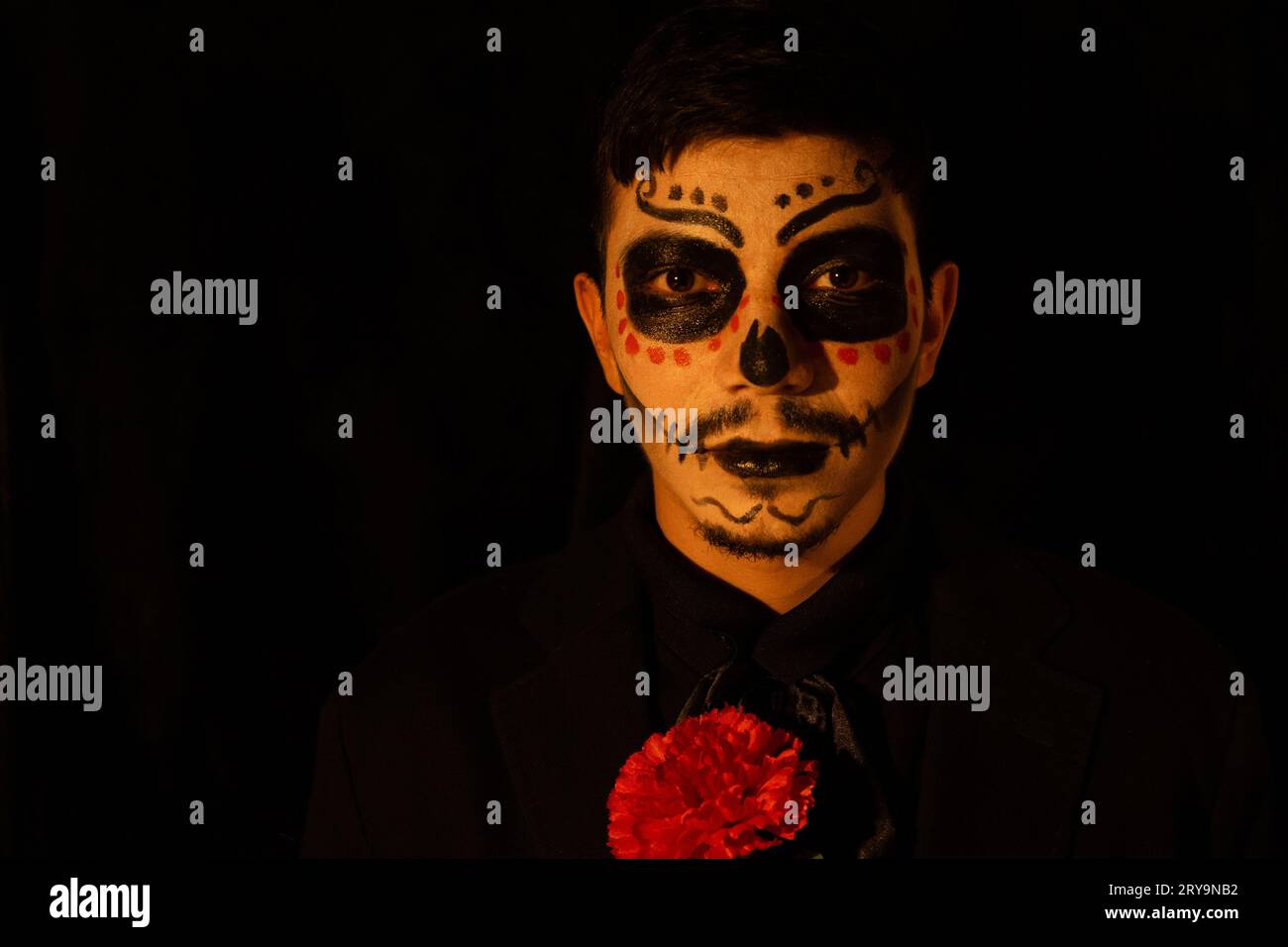 man dressed as a catrín symbolizing the mexican culture of the day of ...