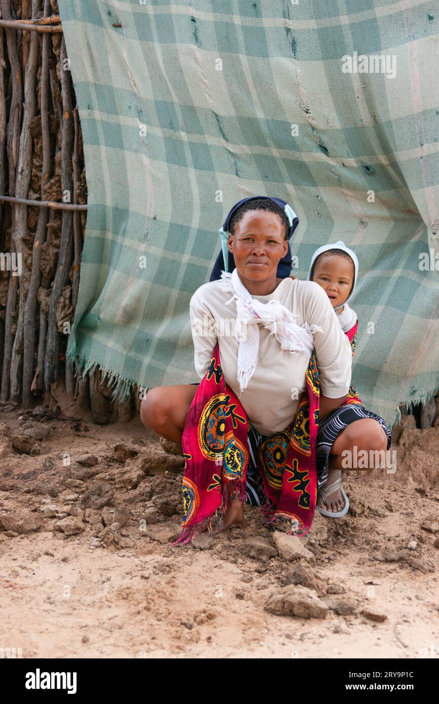 a bushmen San woman from Central Kalahari, village New Xade in Botswana ...