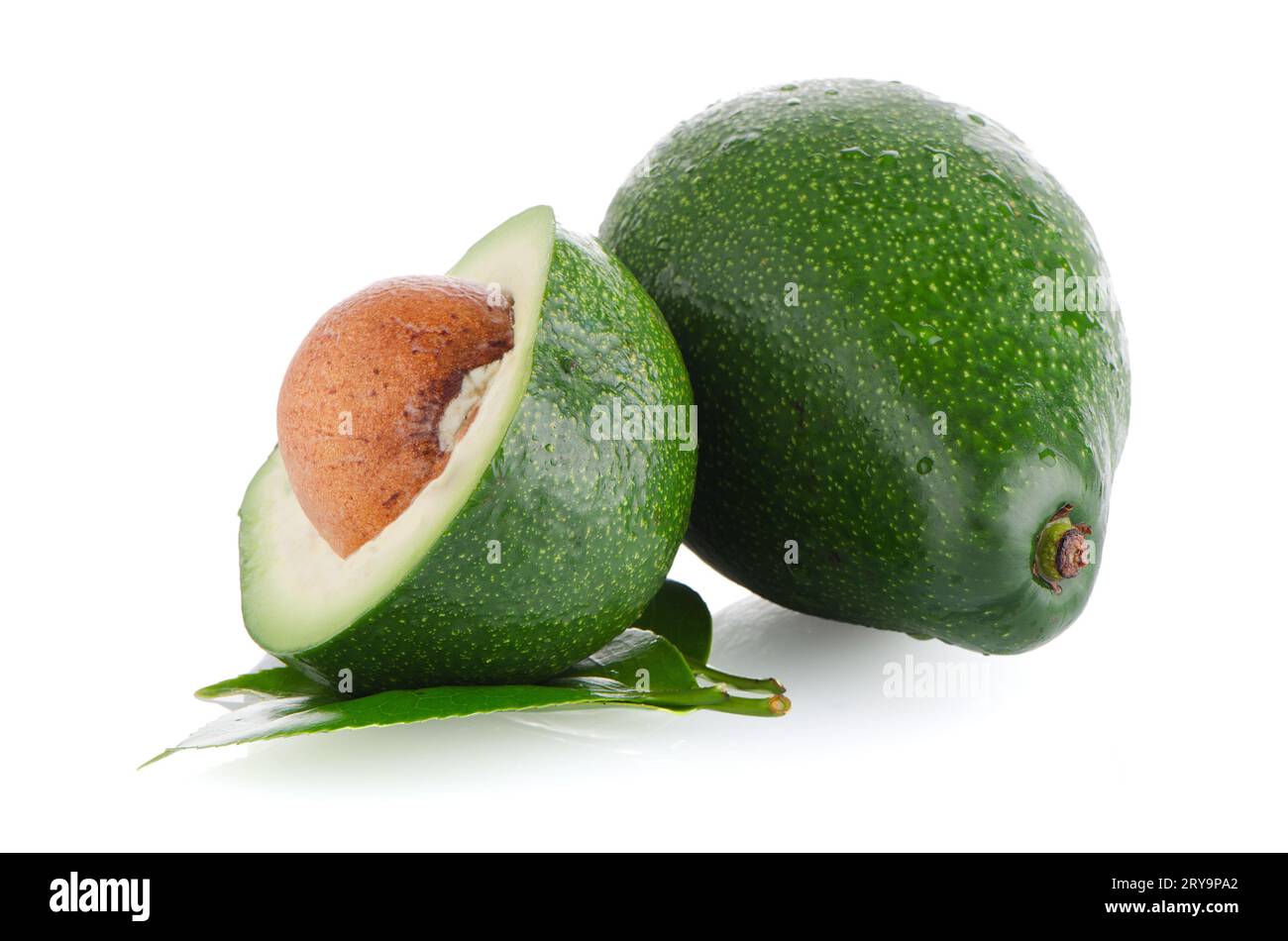Avocados on white Stock Photo - Alamy
