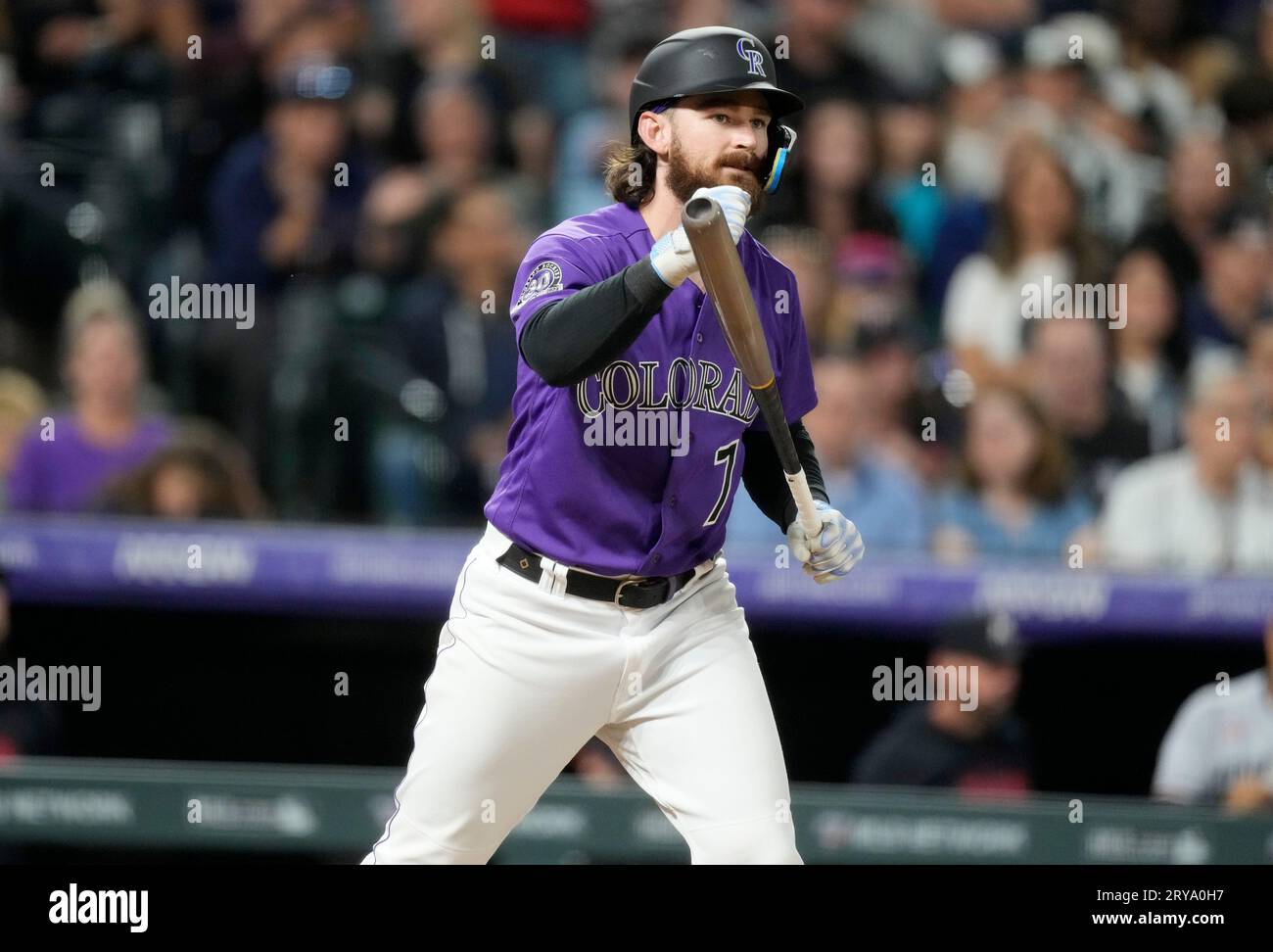 Colorado Rockies' Brendan Rodgers hits his bat after striking out ...