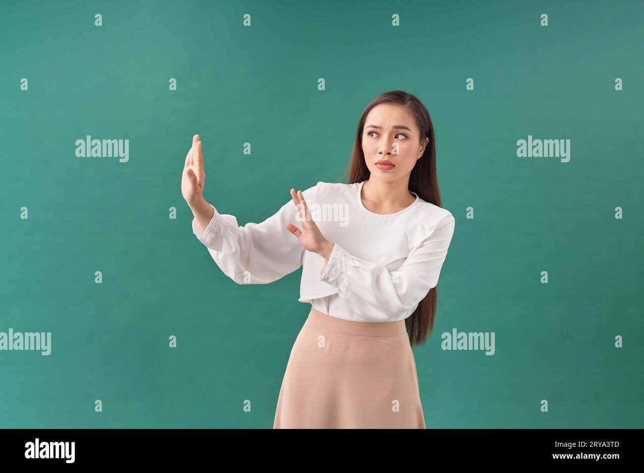 Stop. Concerned Asian woman showing refusal sign, saying no, raise ...