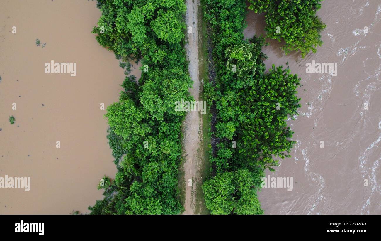 Aerial view of the area affected by rainy season flooding. Top view of ...
