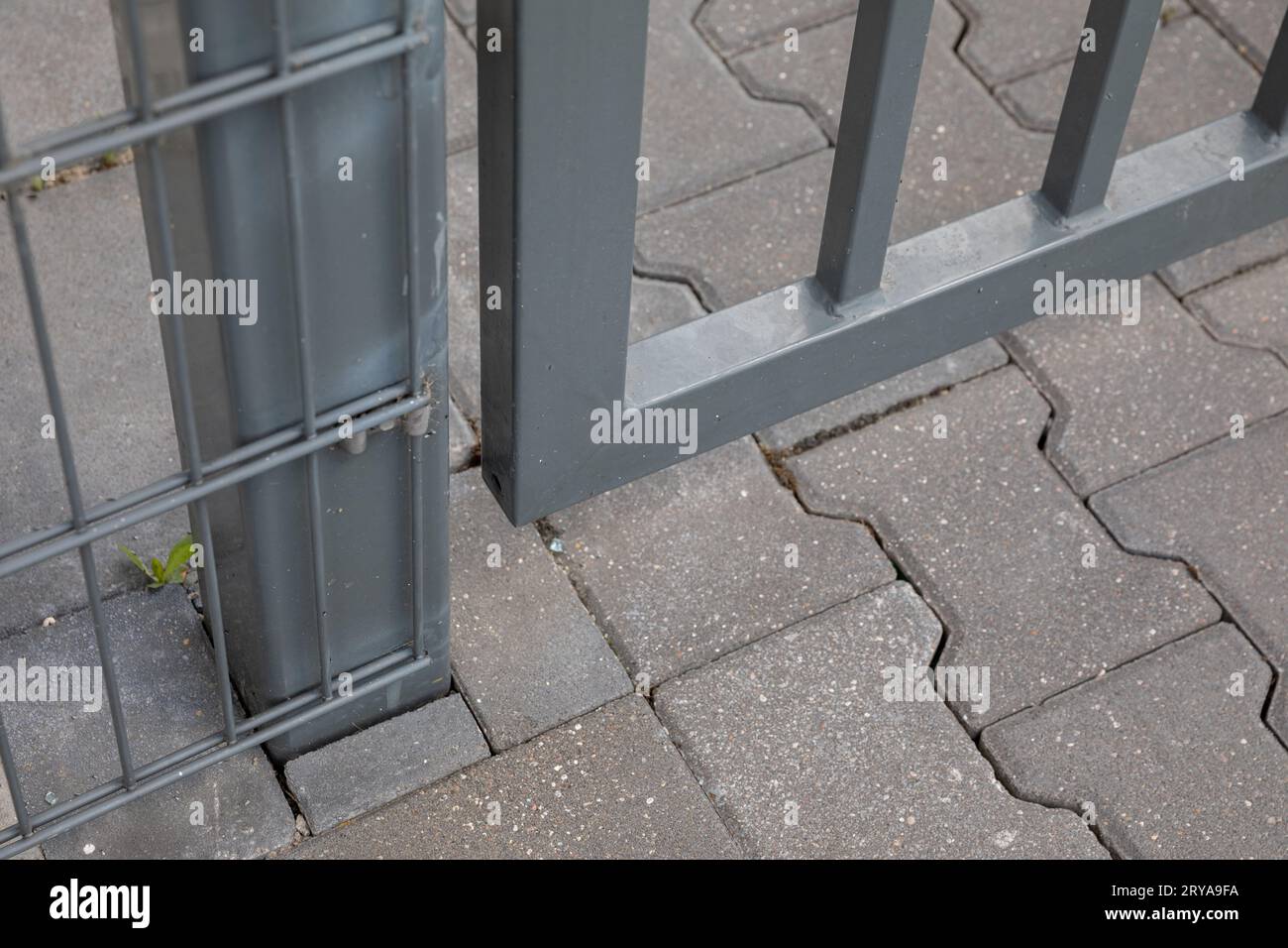 An aerial view of the installed fence post in the paving stones Stock ...
