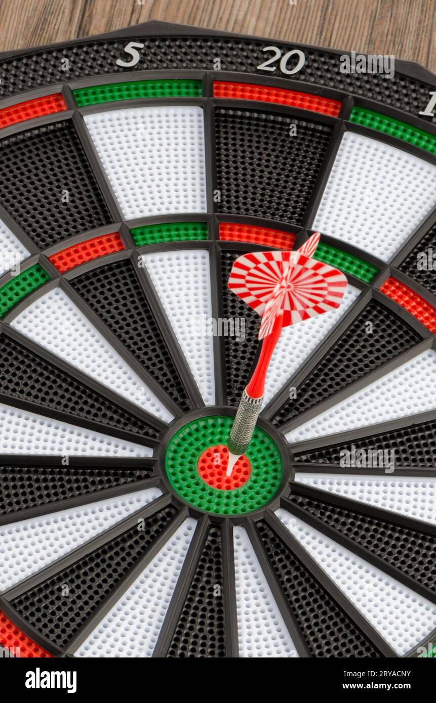 Dart board with dart Stock Photo - Alamy