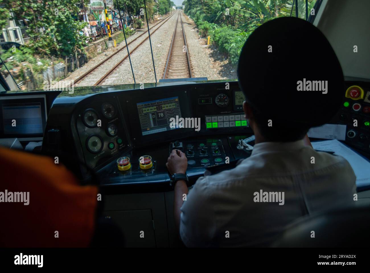 FEEDER TRAIN TEST RUN Machinists operate a feeder train during a test ...