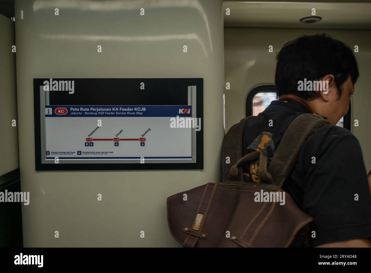 FEEDER TRAIN TEST RUN Passengers in a feeder train during a test run in ...