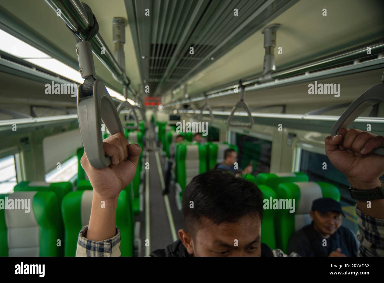 FEEDER TRAIN TEST RUN Passengers in a feeder train during a test run in ...
