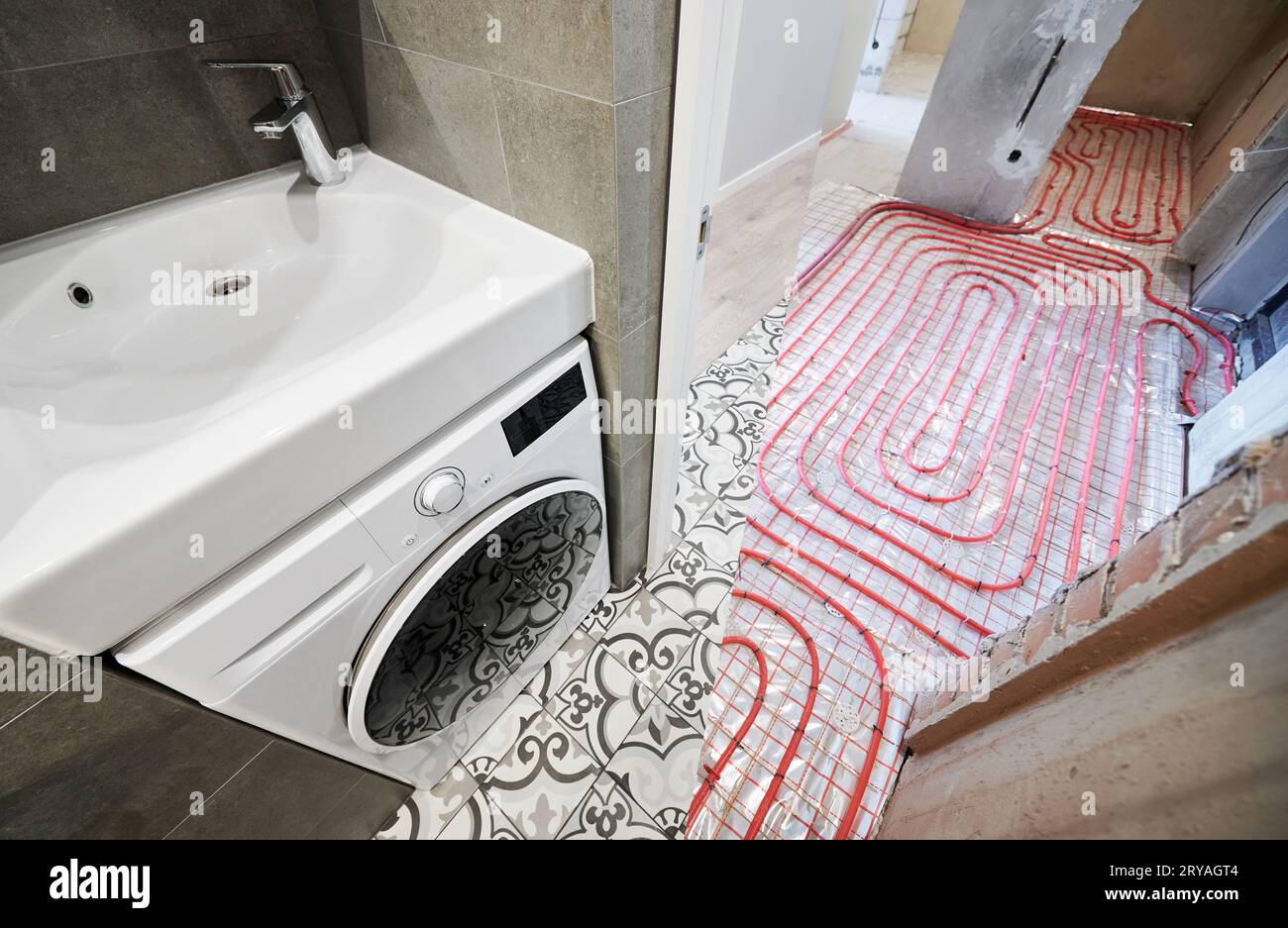 Comparison of washroom lavatory before and after renovation. Old ...