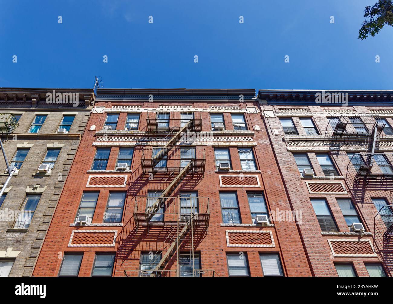 271 and 273 West 150th Street, Harlem, are five-story red brick ...