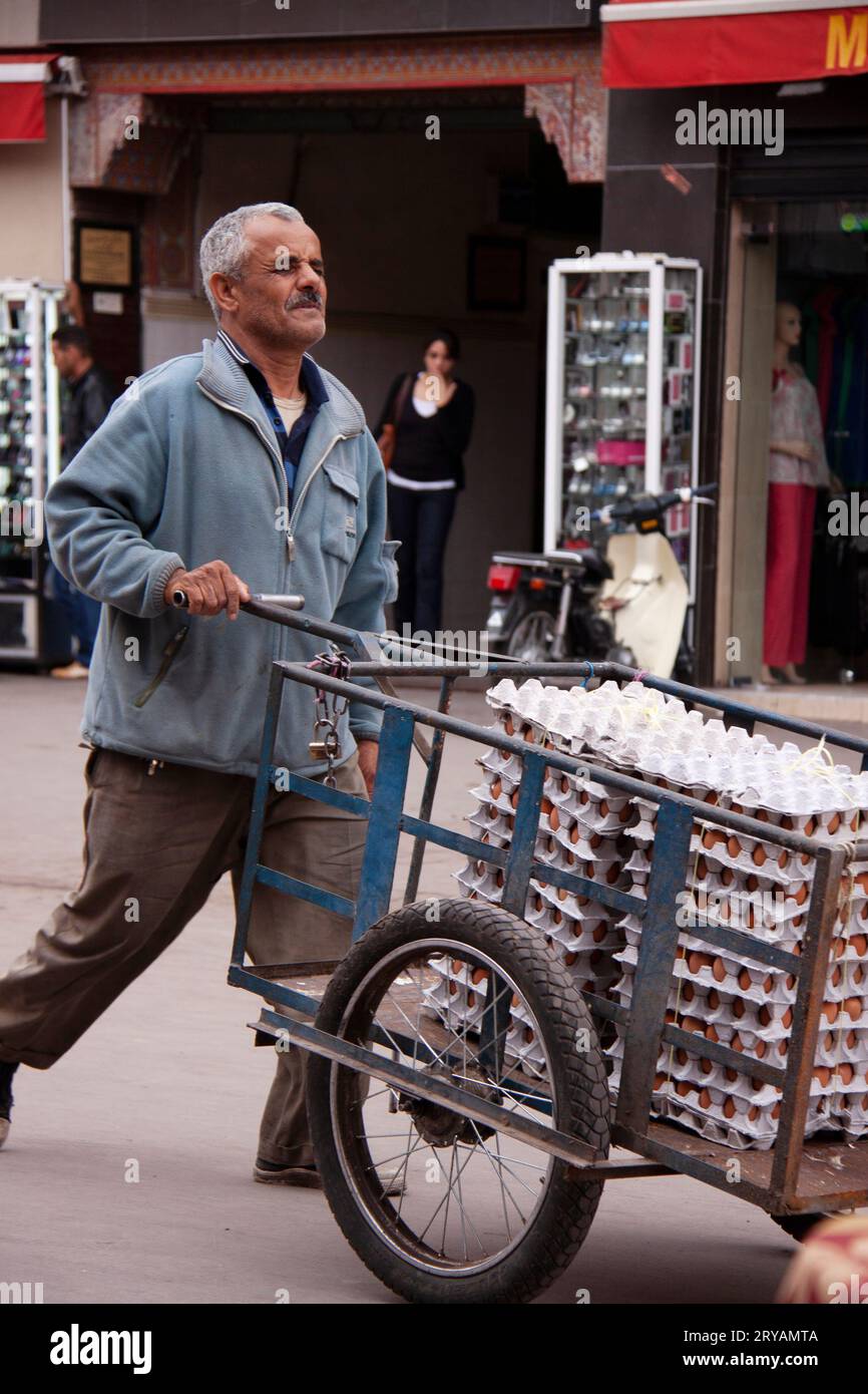 Pushing moped hi-res stock photography and images - Alamy
