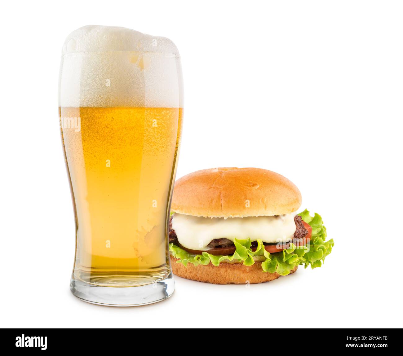 Pint of lager beer with classic hamburger on white background Stock ...