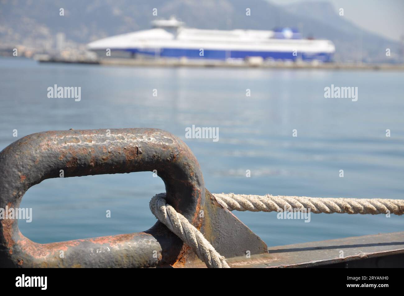 Mooring line turned on a barge fairlead with an NGV in the background ...