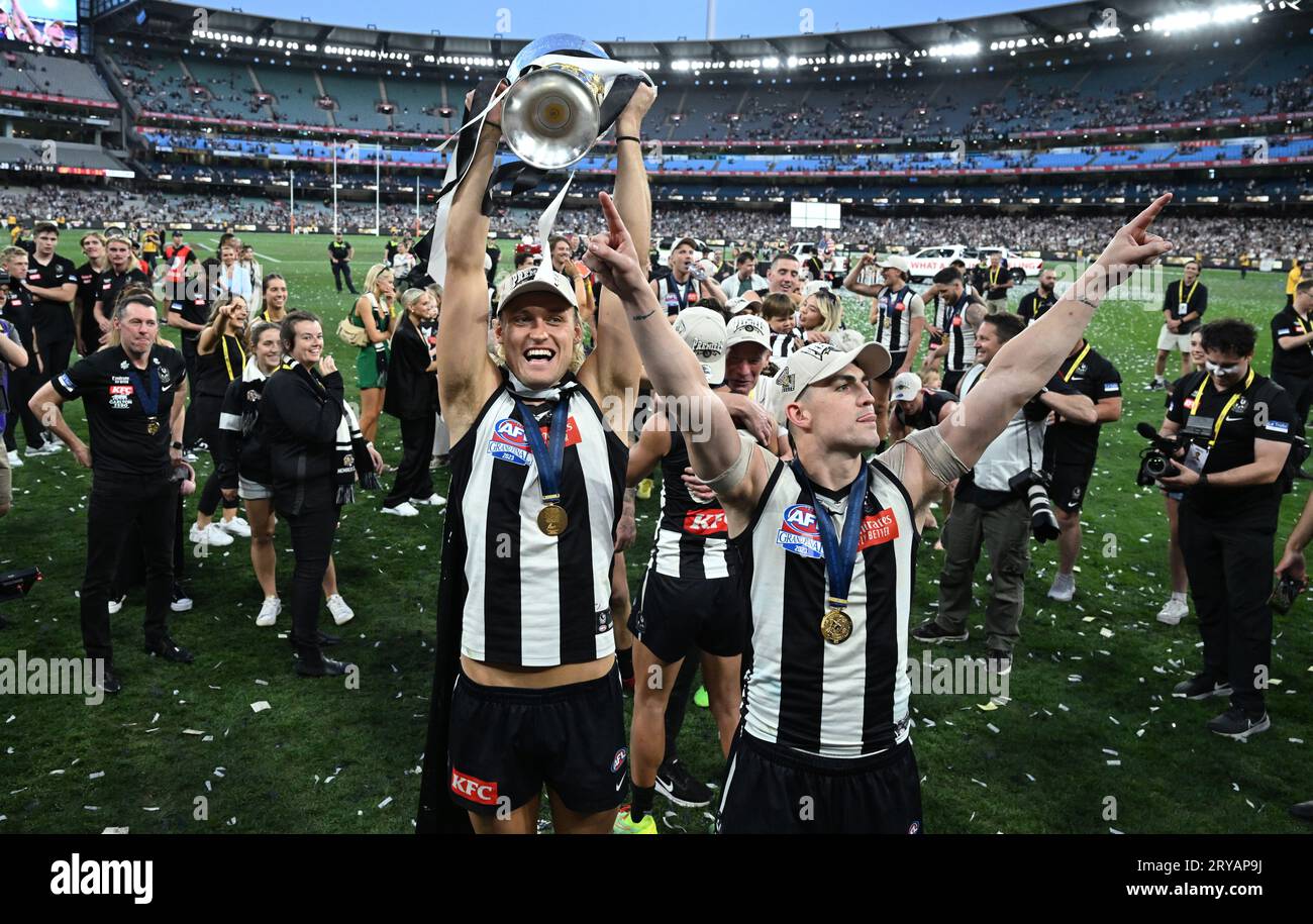 Melbourne, Australia. 30th Sep, 2023. Magpies captain Darcy Moore (left ...