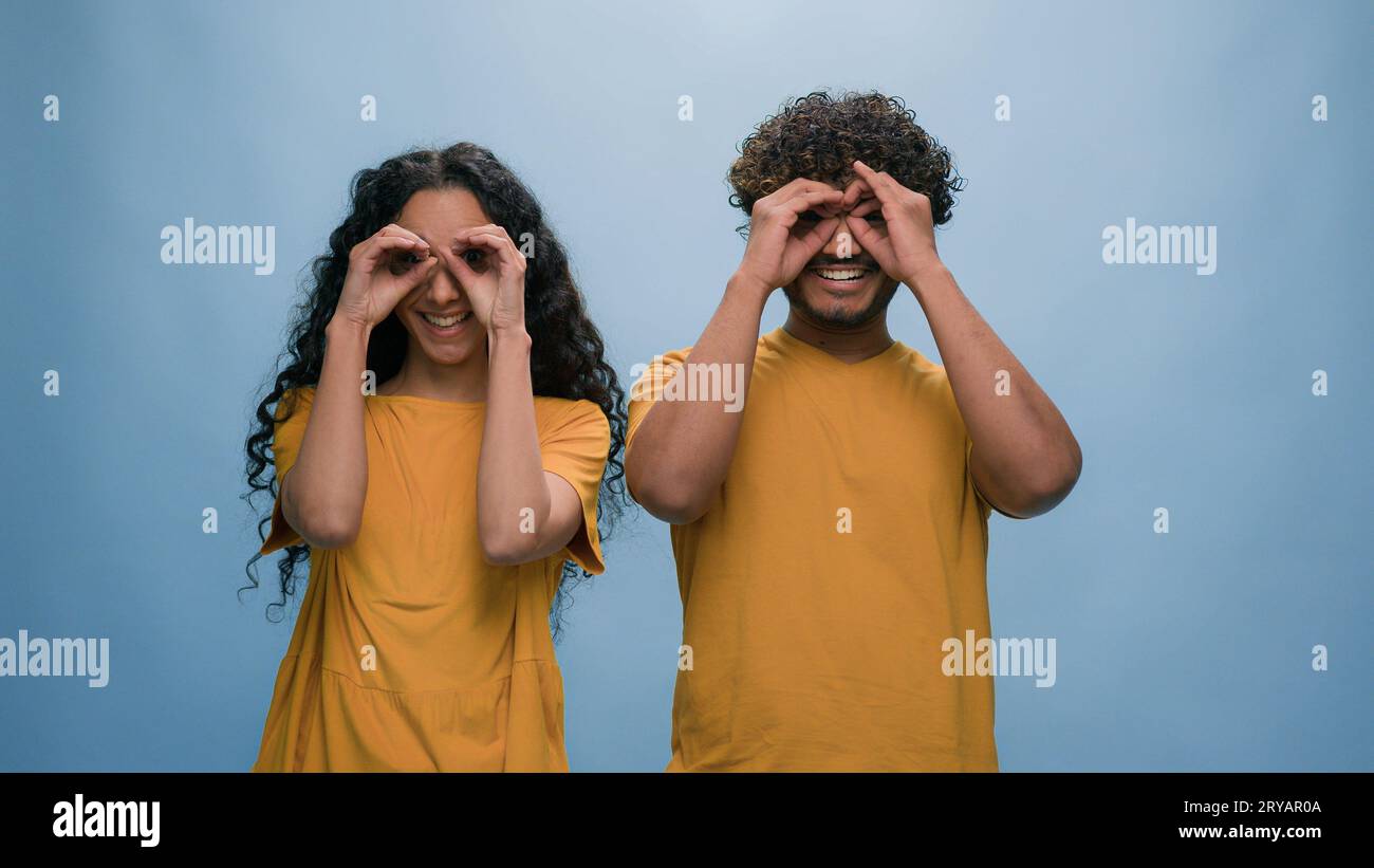 Studio portrait Indian family Arabian couple Hispanic man woman looking ...