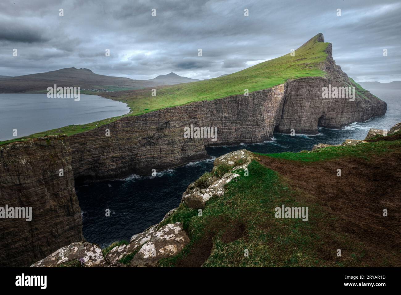 Overhanging lake Sorvagsvatn from the Traelanipa cliffs in Vagar, Faroe ...