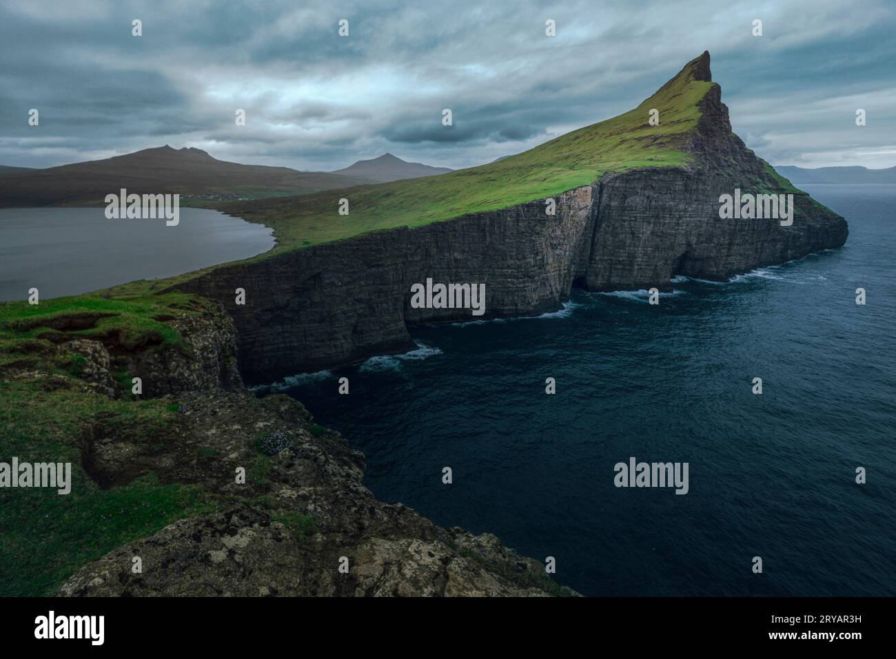 Overhanging lake Sorvagsvatn from the Traelanipa cliffs in Vagar, Faroe ...