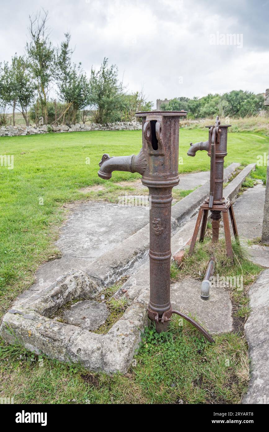 Old water point pipework seen on Lindisfarne (Holy Island Stock Photo ...