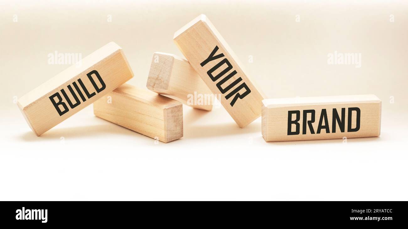 BUILD YOUR BRAND symbol of your brand on a wooden block. BYB Concept ... BUILD YOUR BRAND symbol of your brand on a wooden block. BYB Concept ...