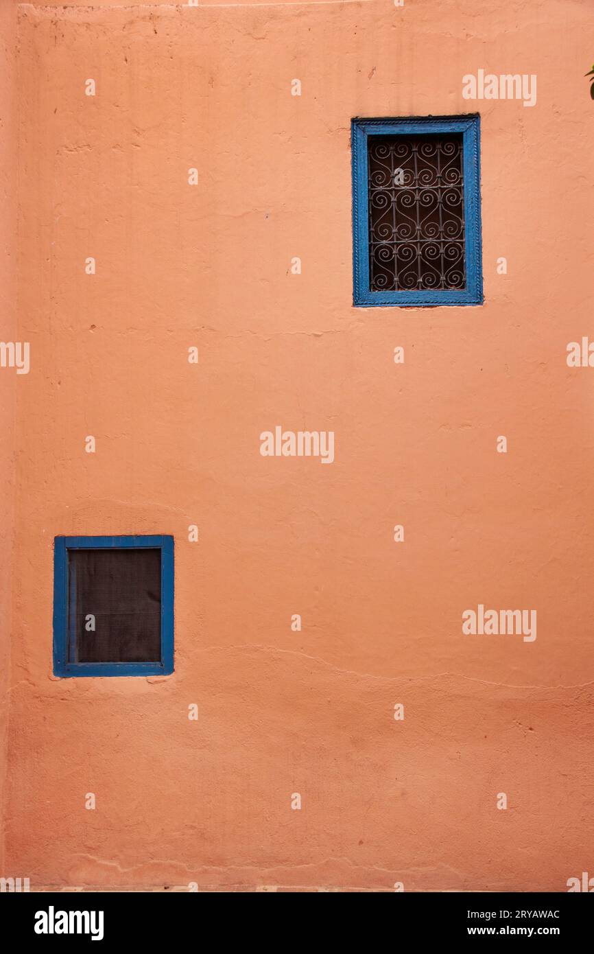 blue frames windows on terracotta building in Morocco March 2012 Stock ...