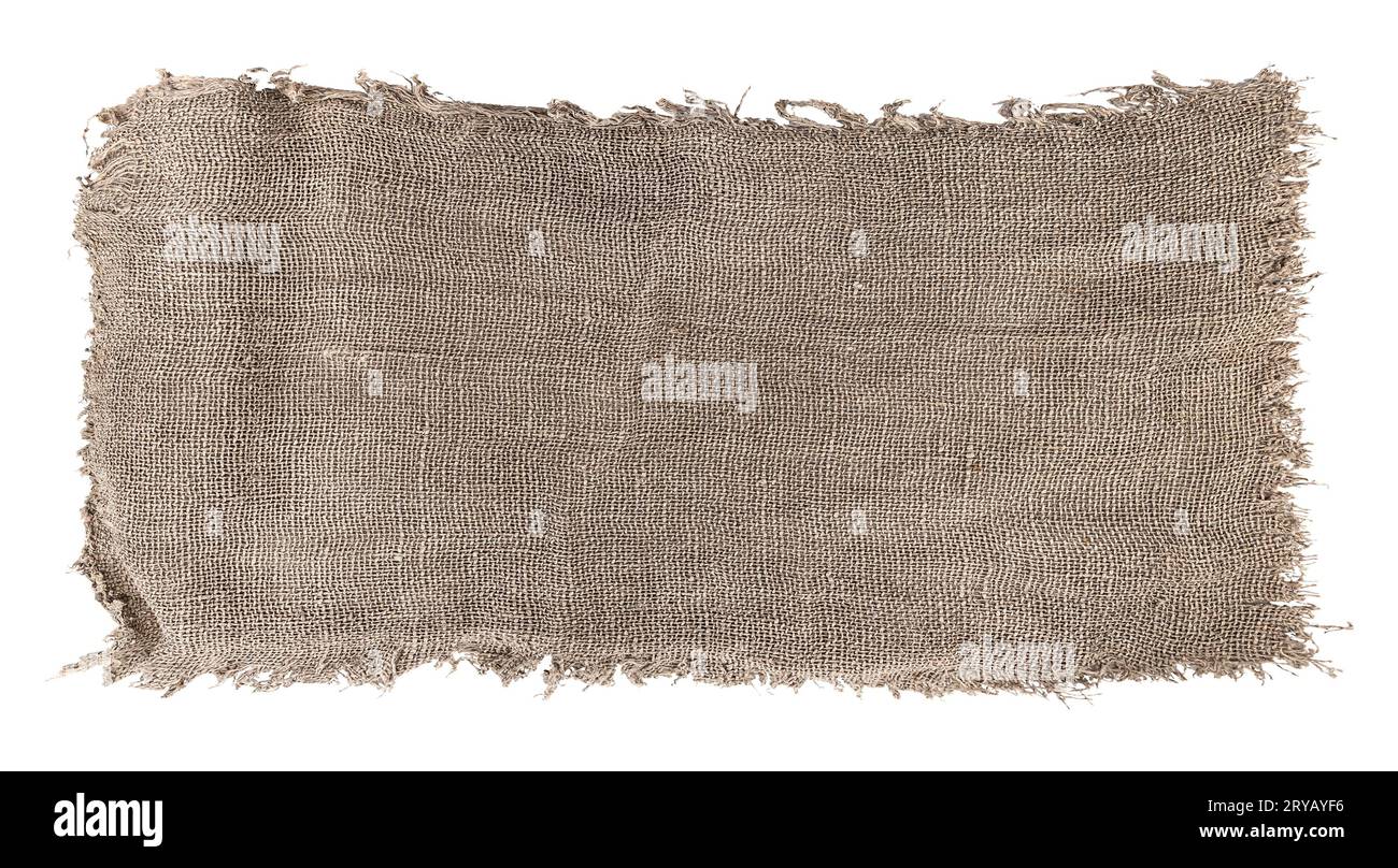 Burlap texture. A piece of torn burlap on a white background. Canvas ...