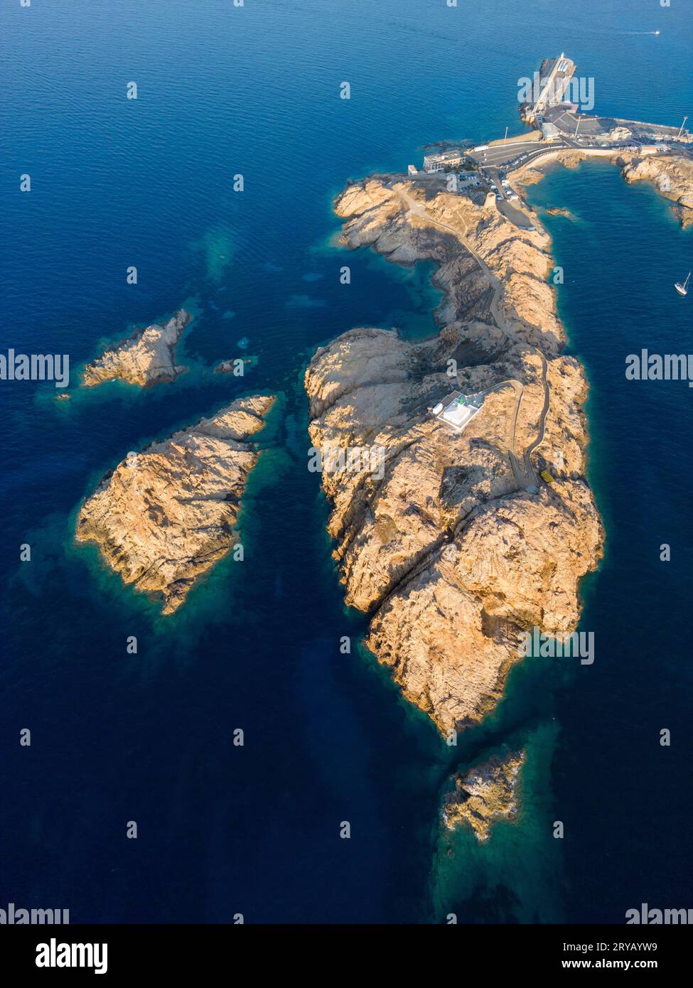 Aerial view of La Pietra lighthouse and island at Ile Rousse in Corsica ...