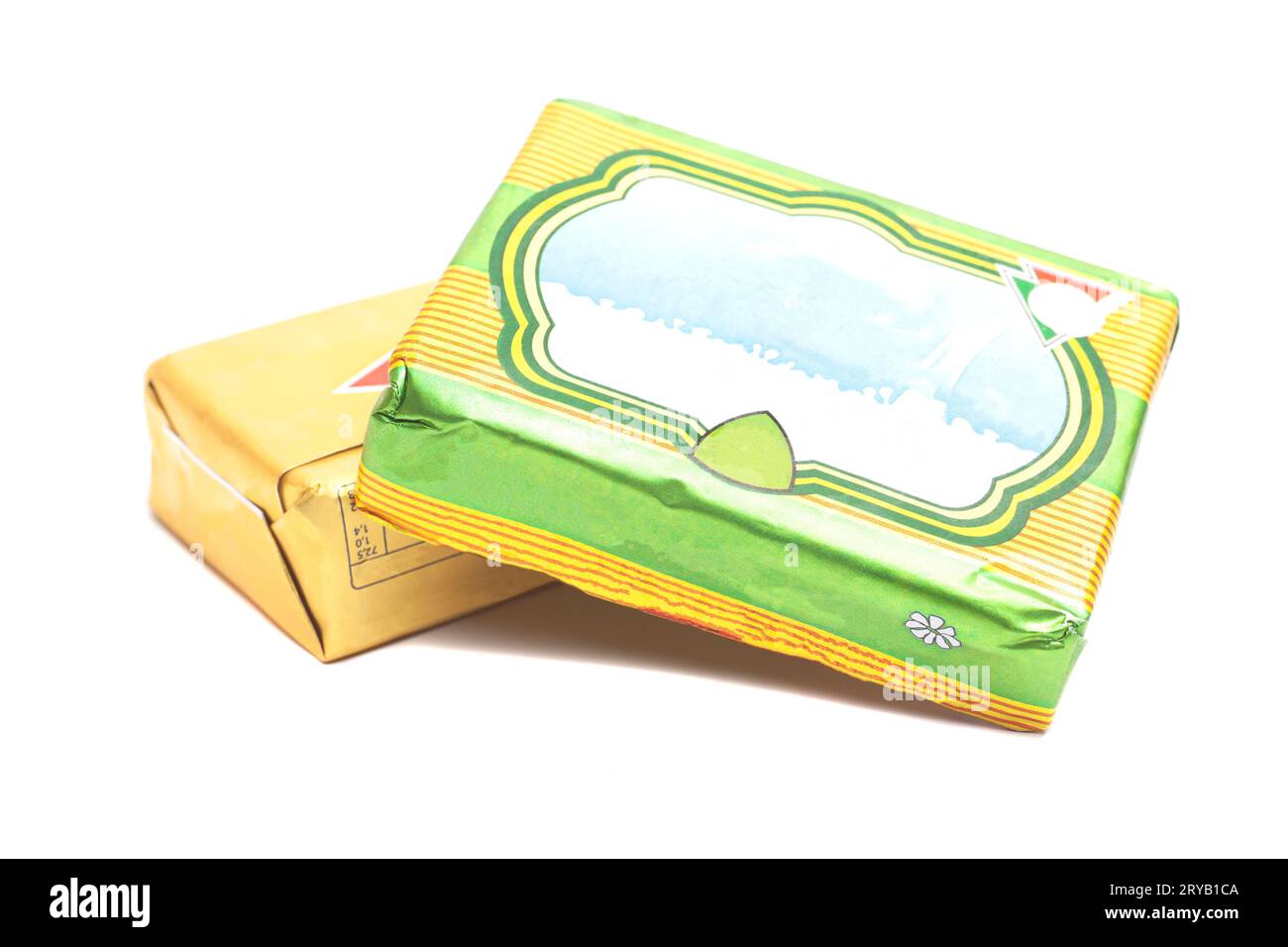 Sticks of wrapped butter isolated on white background Stock Photo - Alamy