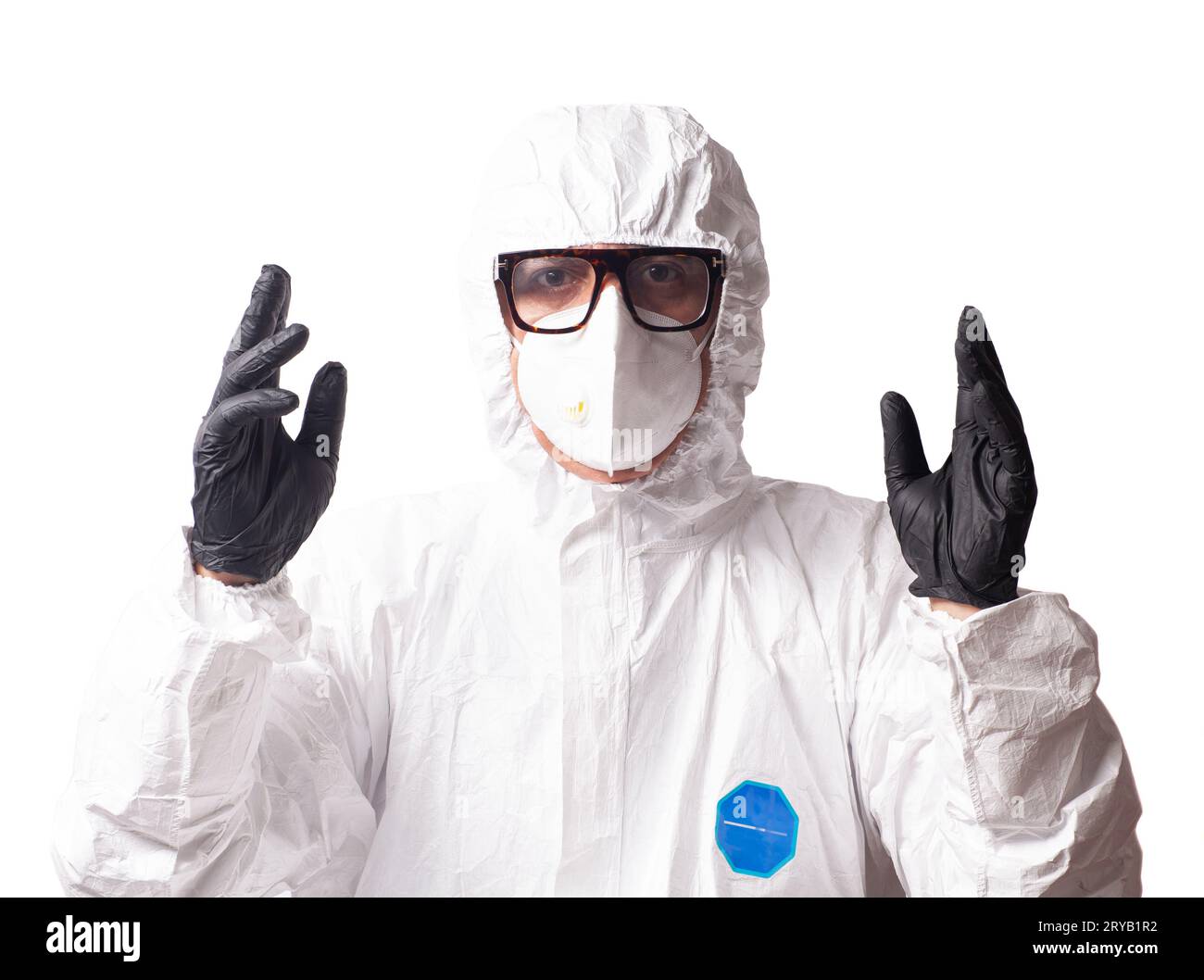 Doctor scientist in protective suit, mask and glasses. Dispersal and ...