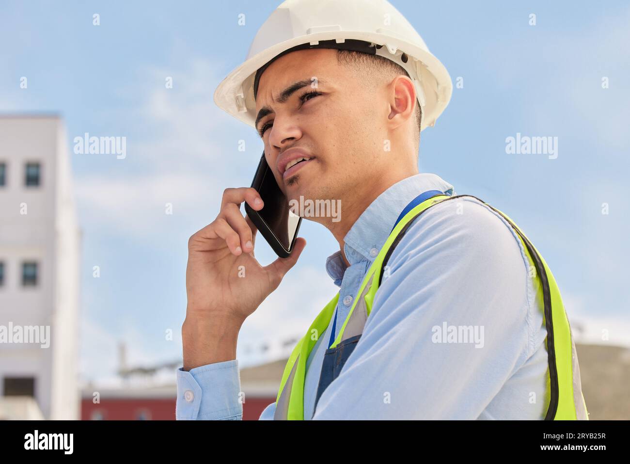 Engineer on construction site, phone call and negotiation for building ...