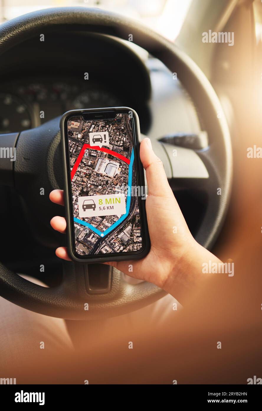 Phone, map and hands of person in a car for location, search or ...