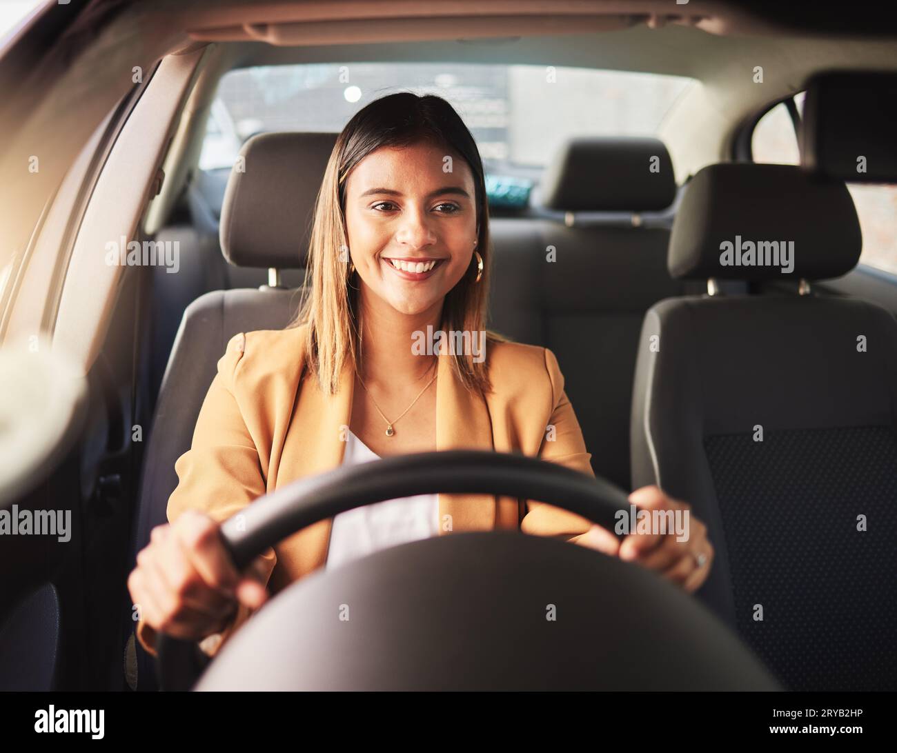 Happy, driving and business woman in car to travel, journey and rent ...
