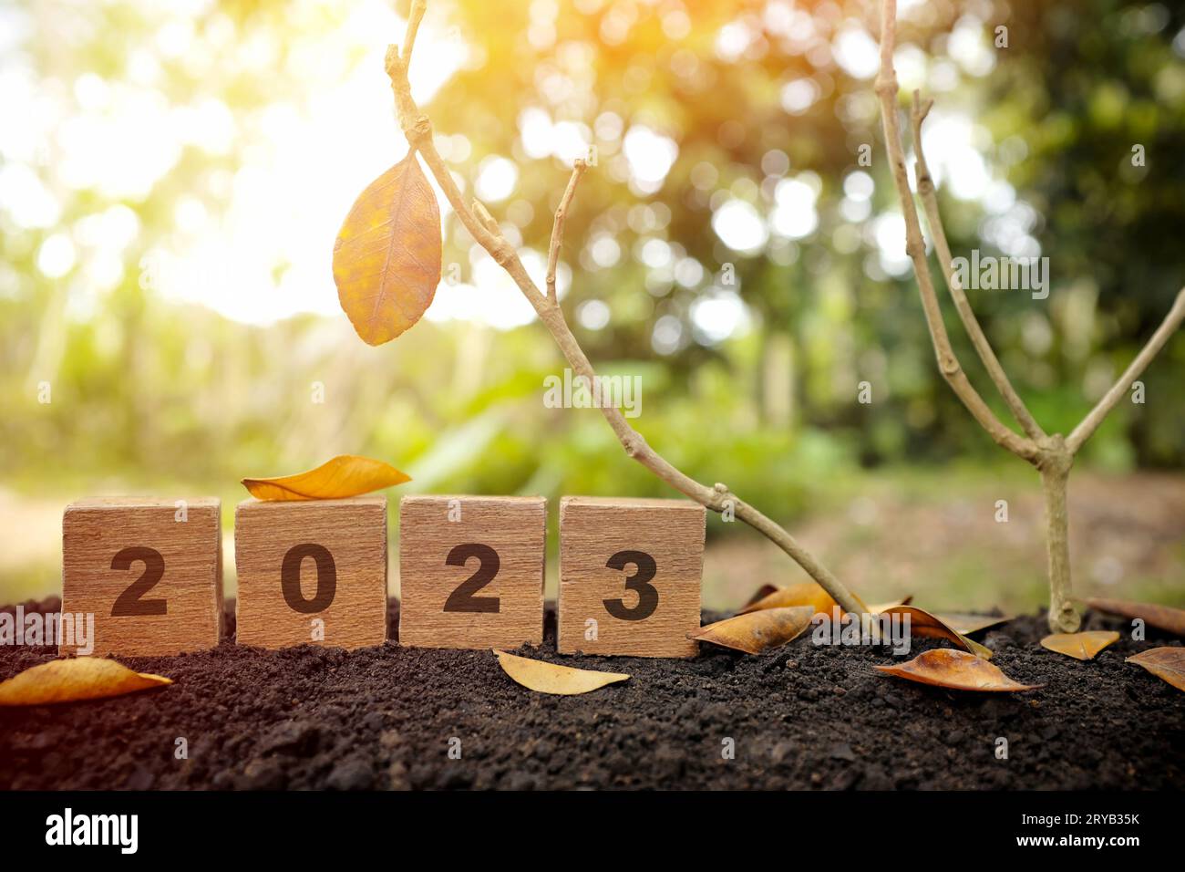 Goodbye, signing off and yearend 2023 concept. Wooden blocks in dark ...
